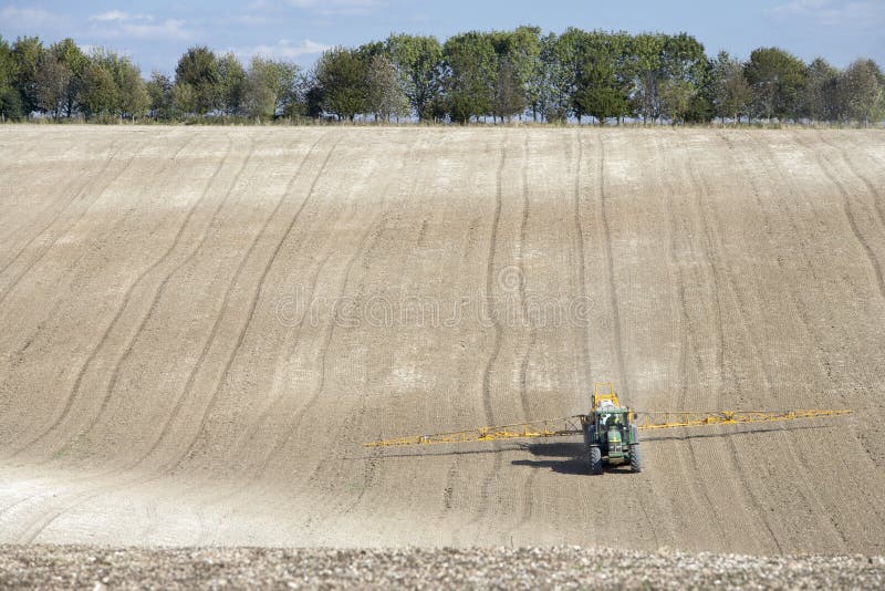 Tractor Spraying Field stock image. Image of agriculture - 9388015