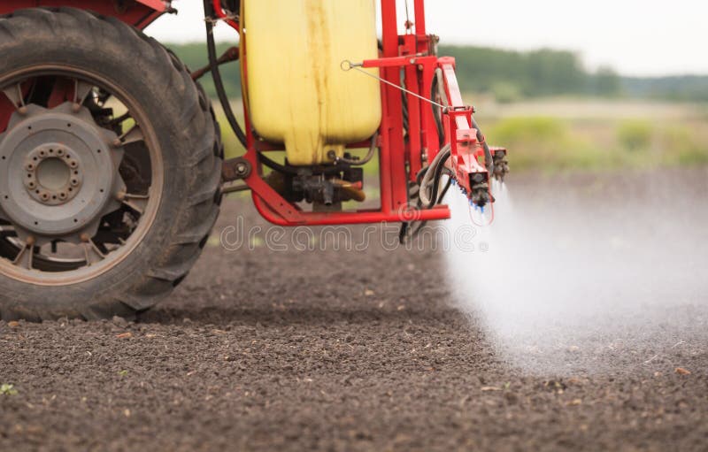 Tractor Spraying Pesticides on Arable Field with Sprayer Stock Image ...
