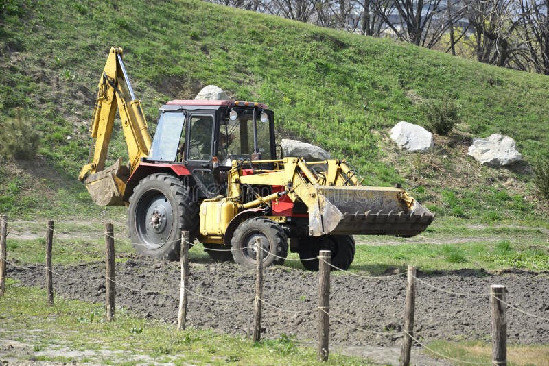 Tractor Spring on the Field. Stock Photo - Image of scene, spring: 49149852