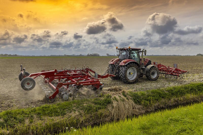 Tractor during Spring Work on the Field Stock Image - Image of ...