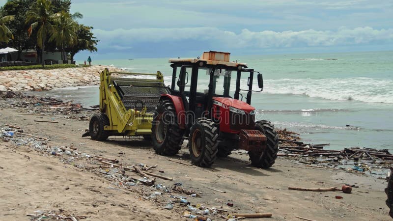 Tractor Technic for Cleaning the Sea Beach from Garbage Stands on the ...