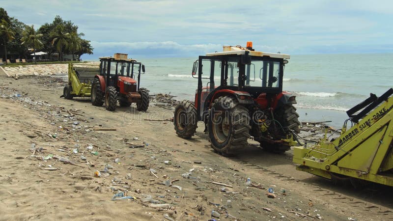 Tractor Technic for Cleaning the Sea Beach from Garbage Stands on the ...