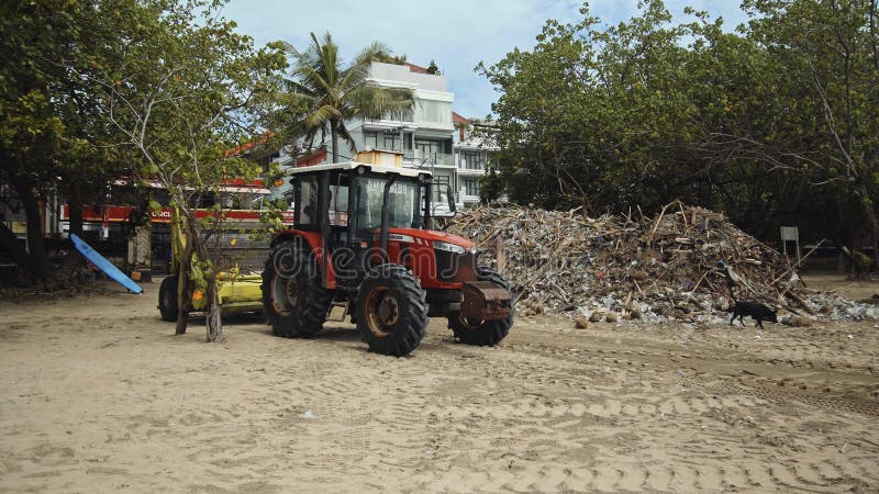 Tractor Technic for Cleaning the Sea Beach from Garbage Stands on the ...