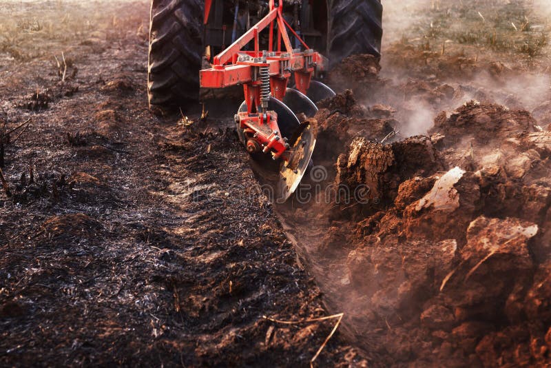 The Tractor is Tilling the Soil, Preparing the Soil for Agricultural ...