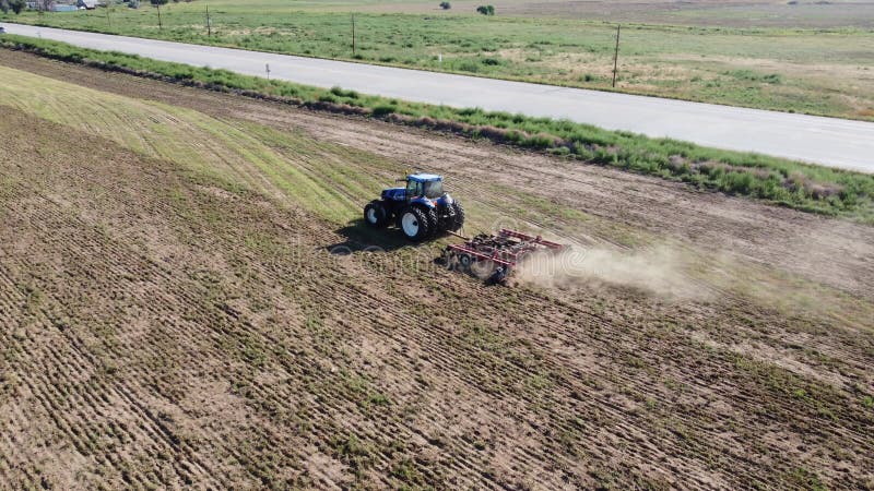 Tractor tilling soil stock video. Video of crop, hitch - 254045681