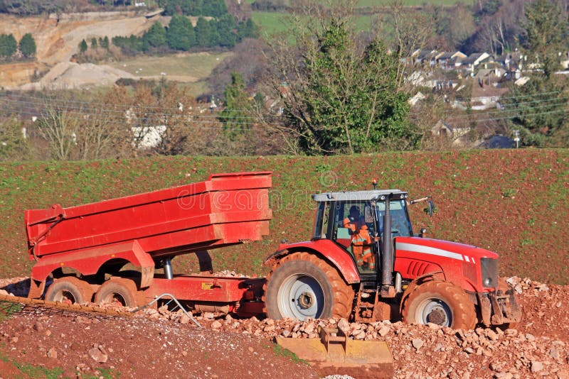 Tractor and tipper trailer editorial photography. Image of grader ...