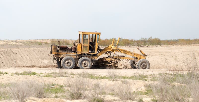 Tractor To Level the Ground for the Road Stock Image - Image of shovel ...