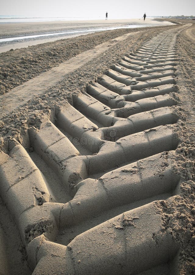 Tractor trail on the beach stock image. Image of diminishing - 22961801