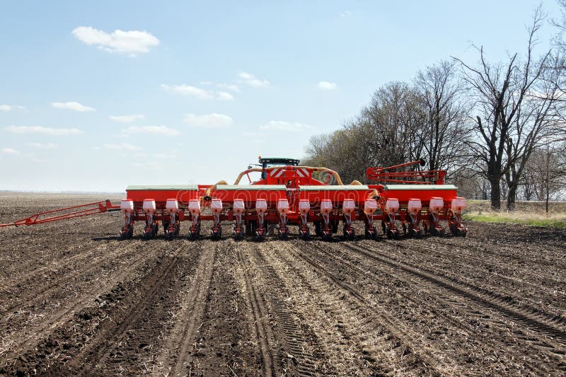 Tractor with Trailed Planter on the Field Stock Image - Image of ...