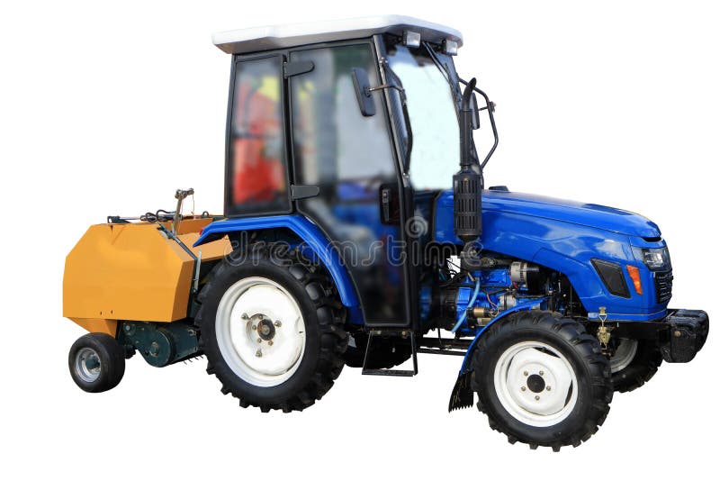 Tractor with a Trailer for Processing Hay Stock Photo - Image of ...