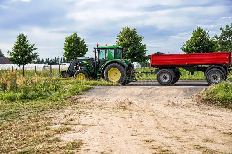 Tractor with Trailer on Rural Road , Stock Photo - Image of driving ...