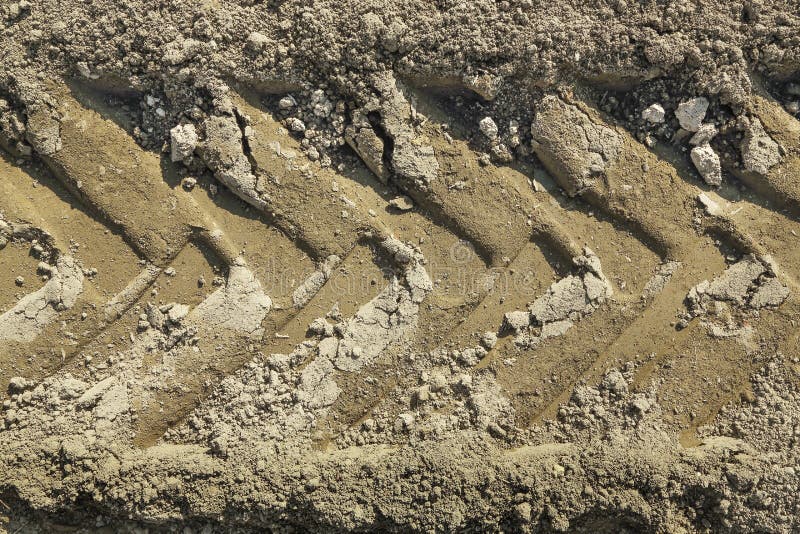 Tractor tread mark stock image. Image of closeup, land - 233393107