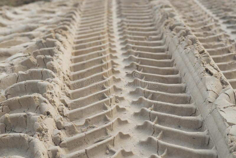 Tractor Tyre Imprints in Sand Stock Photo - Image of outdoors, dust ...