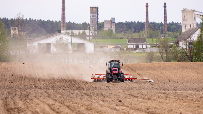 The Tractor is Used To Sow Seeds in the Field Using a Specialized ...
