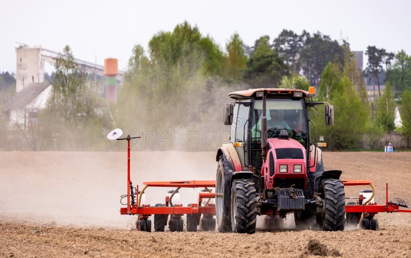 The Tractor is Used To Sow Seeds in the Field Using a Specialized ...