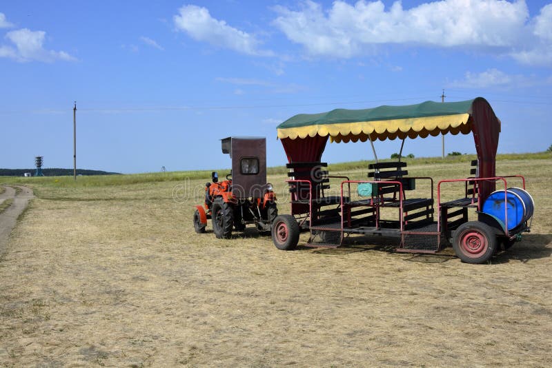 Tractor wagon for tourists stock image. Image of rural - 122547255