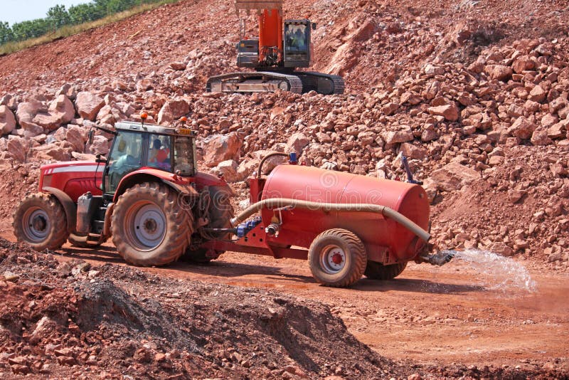 Tractor and Water Bowser stock photo. Image of water - 46483474