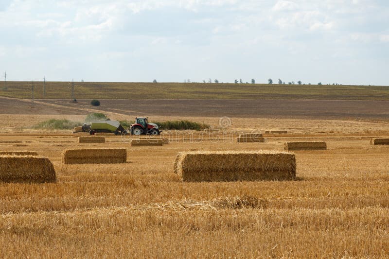 Tractor with Wheat Straw Baler Stock Photo - Image of silage ...
