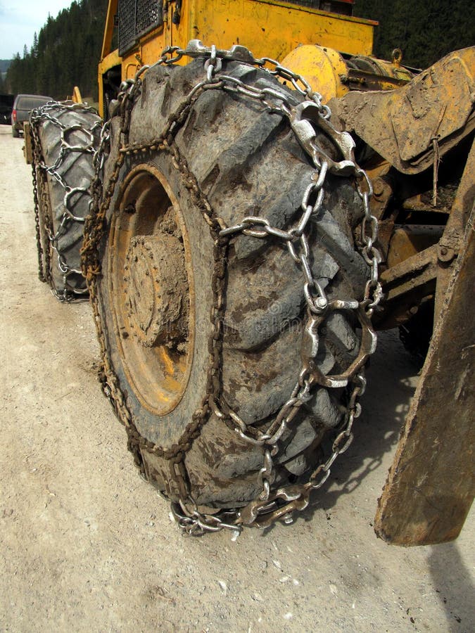 Tractor wheel with chain stock image. Image of forest - 39714251