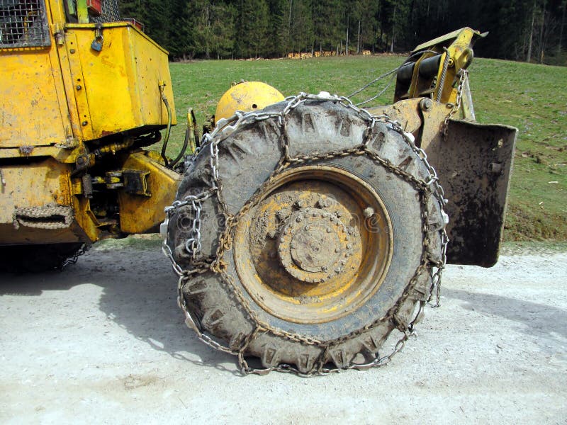 Tractor wheel with chain stock image. Image of mountain - 39714325