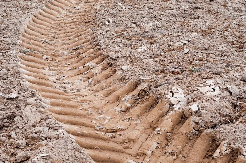 Tractor Wheel Tracks on the Ground Stock Image - Image of damp, ground ...