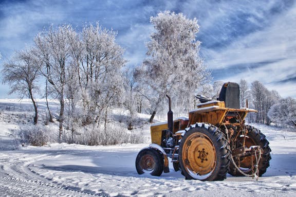 Tractor in the winter stock image. Image of road, freeze - 23311349