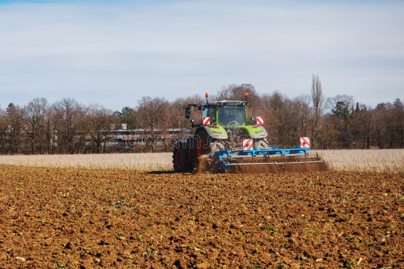 A tractor at work stock photo. Image of road, agricultural - 120583802