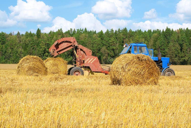 Tractor at work in field stock image. Image of cleaning - 26384387