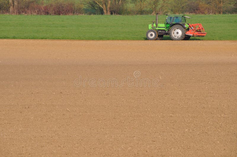 Tractor Working in the Field Stock Image - Image of horizon, machinery ...