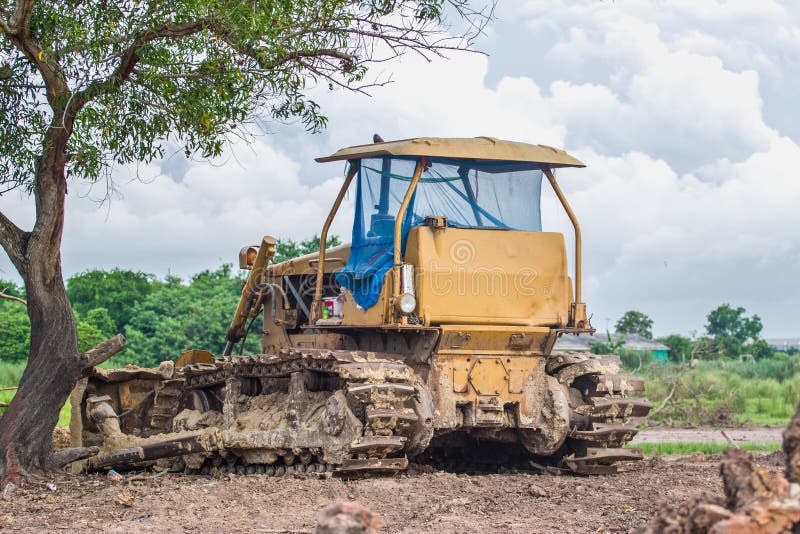 The Tractor is Working at Construction Site Stock Photo - Image of ...