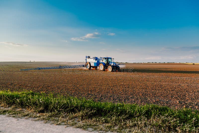 Tractor Working in Field Agriculture Stock Photo - Image of equipment ...