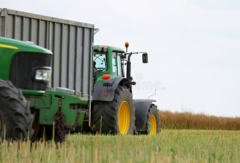 Tractor Working On The Field Editorial Photography - Image of farm ...