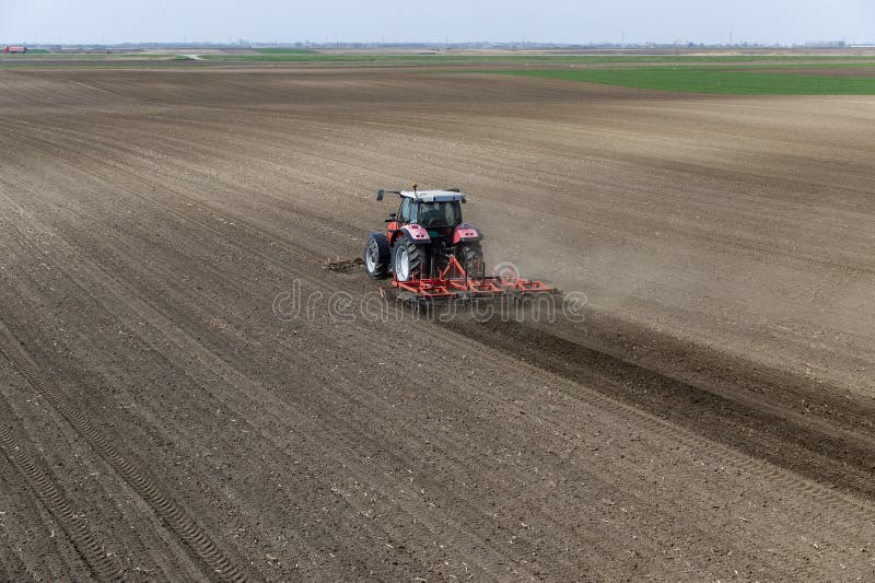 Tractor Working in the Field Stock Photo - Image of drill, farm: 177785160