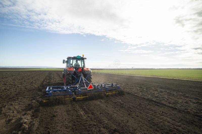 Tractor Working in the Field Stock Photo - Image of land, drill: 311496454