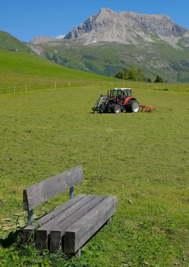 A Tractor Working in the Fields High in the Mountains Stock Photo ...