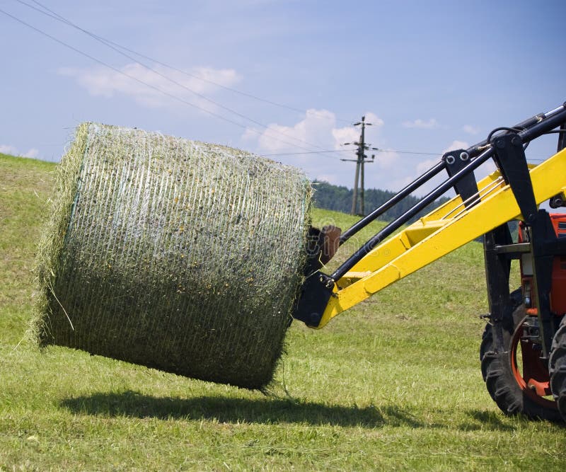 Tractor Working With A Hay Bale Stock Image - Image of harvest ...
