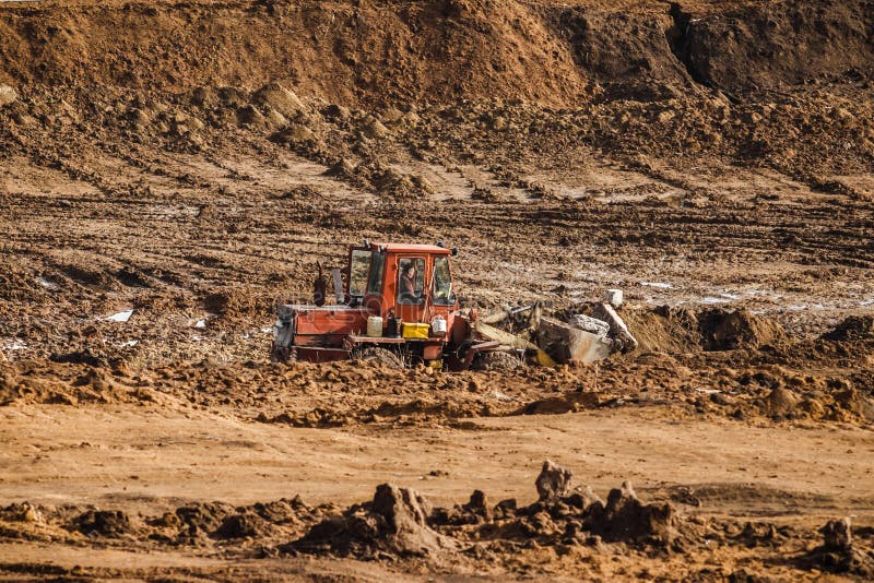 Tractor Working and Prepares Ground at Construction Site Stock Photo ...