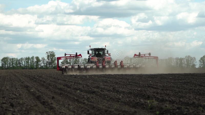Tractor Works in the Field. Sowing Corn. Precision Farming. Stock Video ...