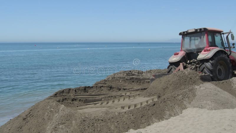 Tractor Nivelating Sand in Works of Regeneration of Beaches Stock Video ...