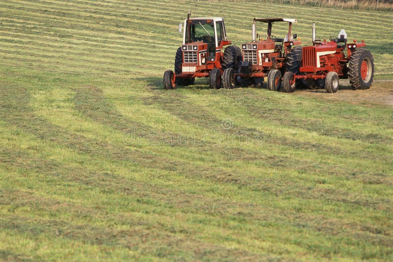 Tractors on the field editorial photo. Image of united - 23161091