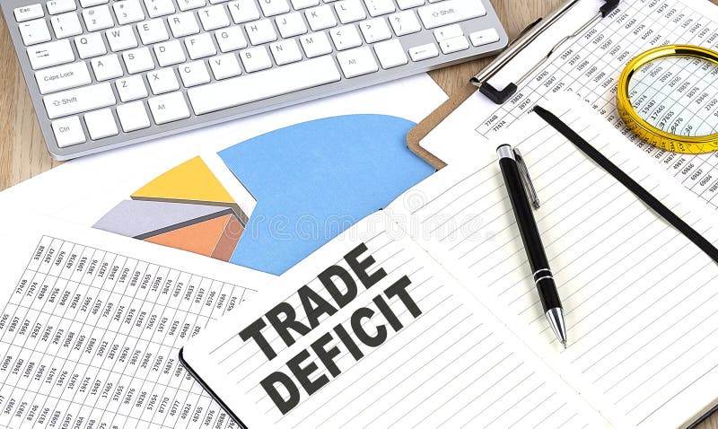 TRADE DEFICIT Text on Notebook with Chart and Keyboard Stock Photo ...