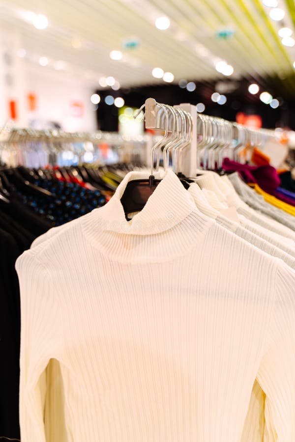 Trade Sale. Clothes on a Hanger in a Store Stock Photo - Image of dress ...