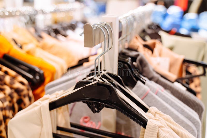 Trade Sale. Clothes on a Hanger in a Store Stock Image - Image of ...
