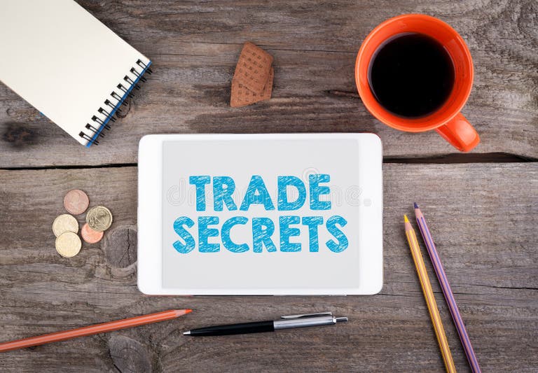 Trade Secrets. Tablet Device on a Wooden Table Stock Photo - Image of ...