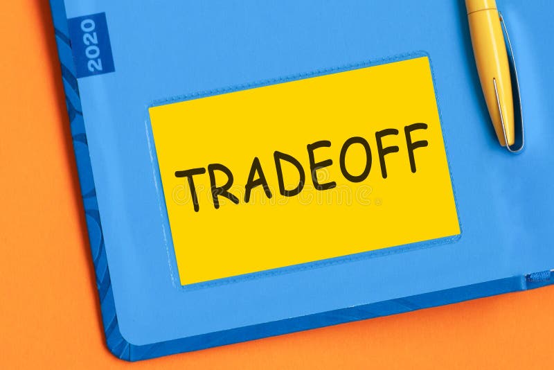 TRADEOFF the Word is Written in Black Letters on the Yellow Paper for ...