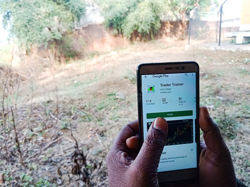 Trader Trainer Online Share Trading App for Smart Phone User Displayed ...