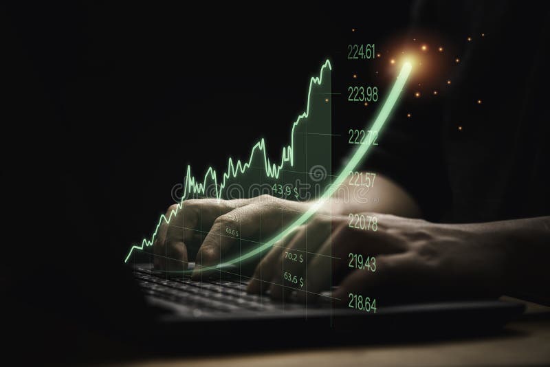 Trader Using Computer Laptop with Increasing Virtual Investment Graph ...