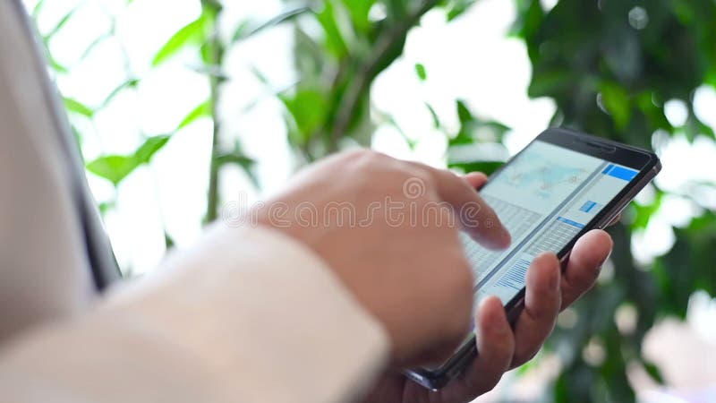 Trader Using Mobile Phone stock footage. Video of mobile - 139007766