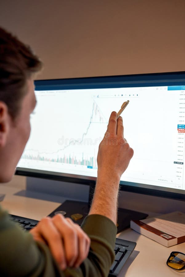 Trader Watch and Point on Graph on Computer Stock Image - Image of analyst, desk: 241644331
