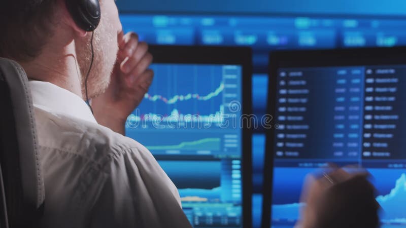 Trader Works in Office Using Workstation and Analysis Technology ...